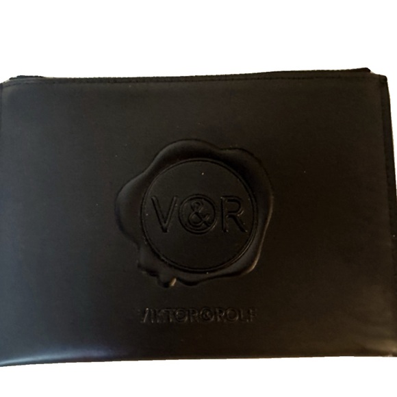 Viktor & Rolf | Bags | Viktor Rolf Black Wallet With Embossed Logo ...